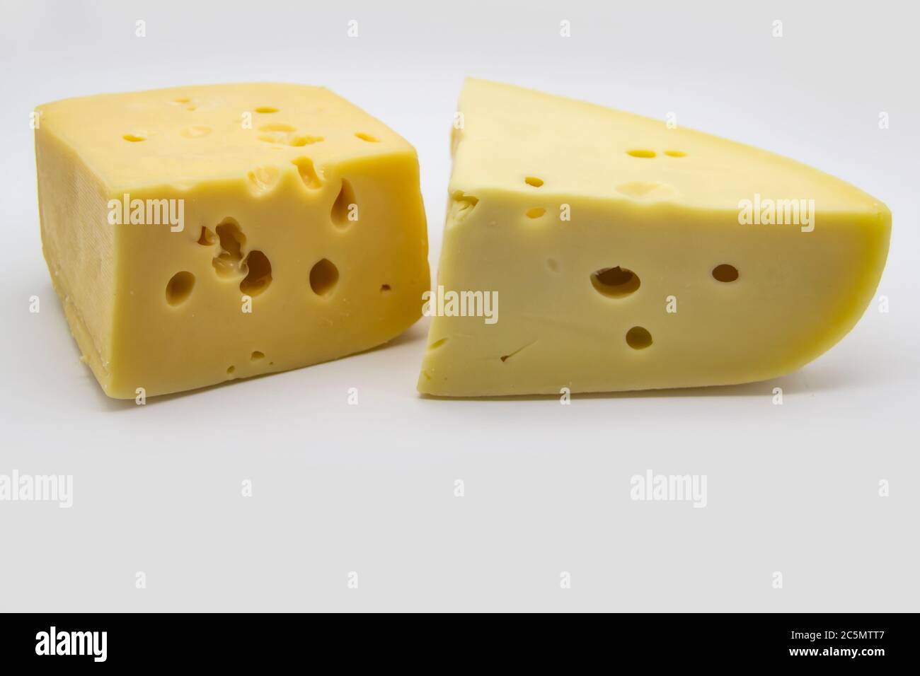 Hard cheese holes on cutting hi-res stock photography and images - Alamy