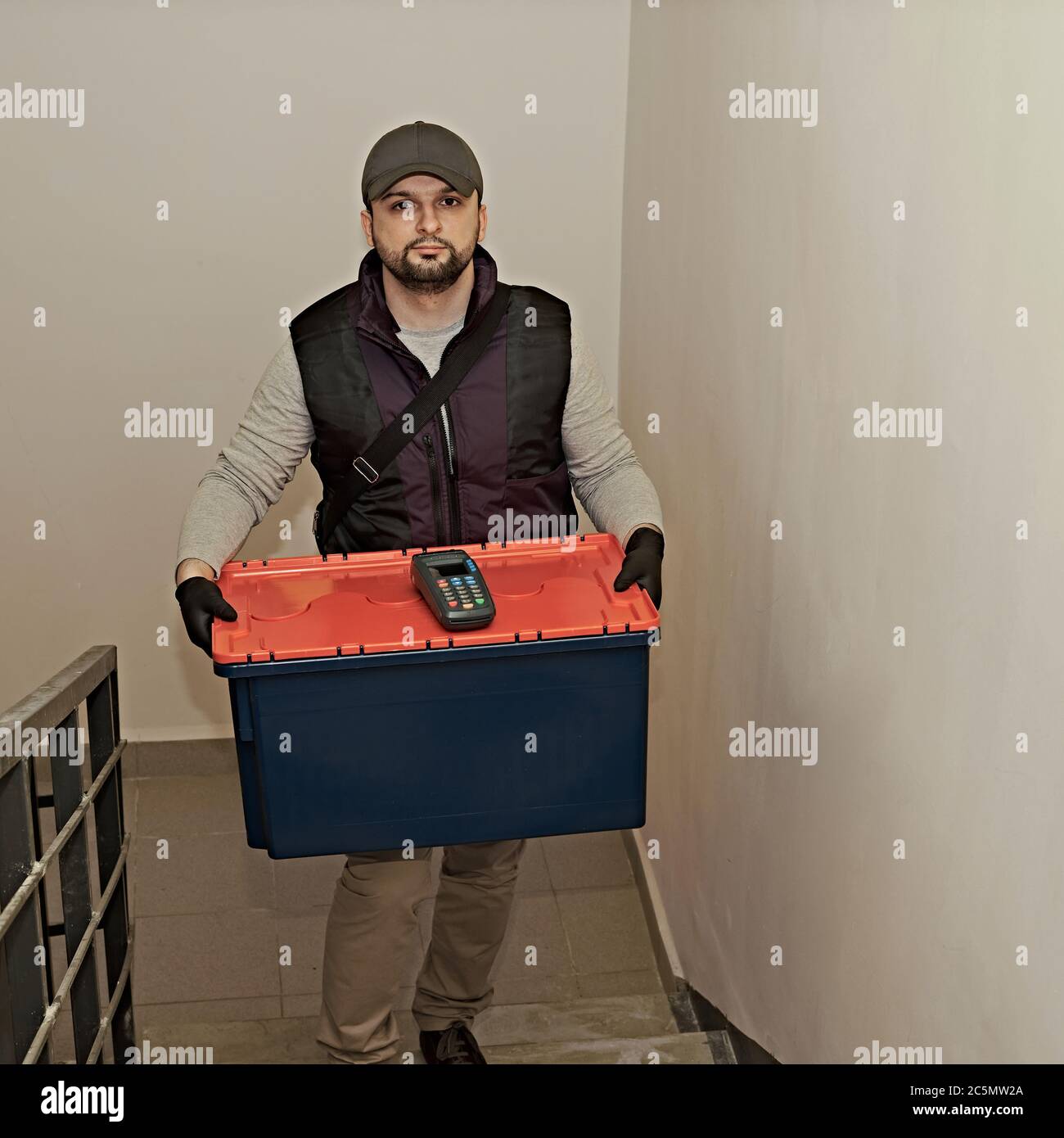 The courier delivers the goods. Delivery in boxes and packages Stock ...