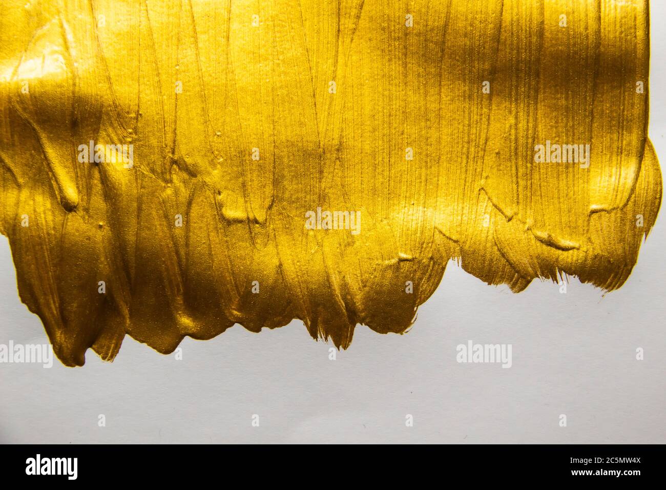 Abstract gold painting on the paper. Hand drawn brush stroke, gold ...