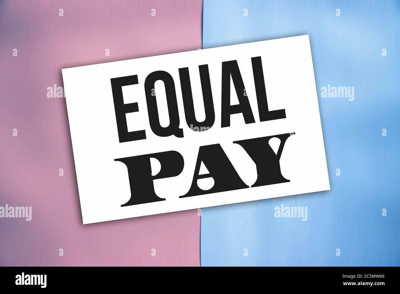Equal pay words on card put on pink and baby blue background. Gender ...
