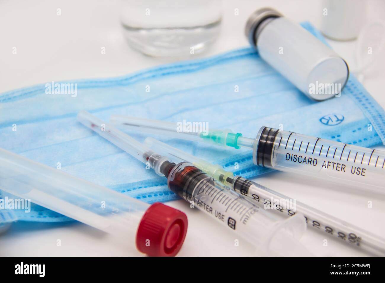 On the table are medical items and injection syringes. Medicine concept ...