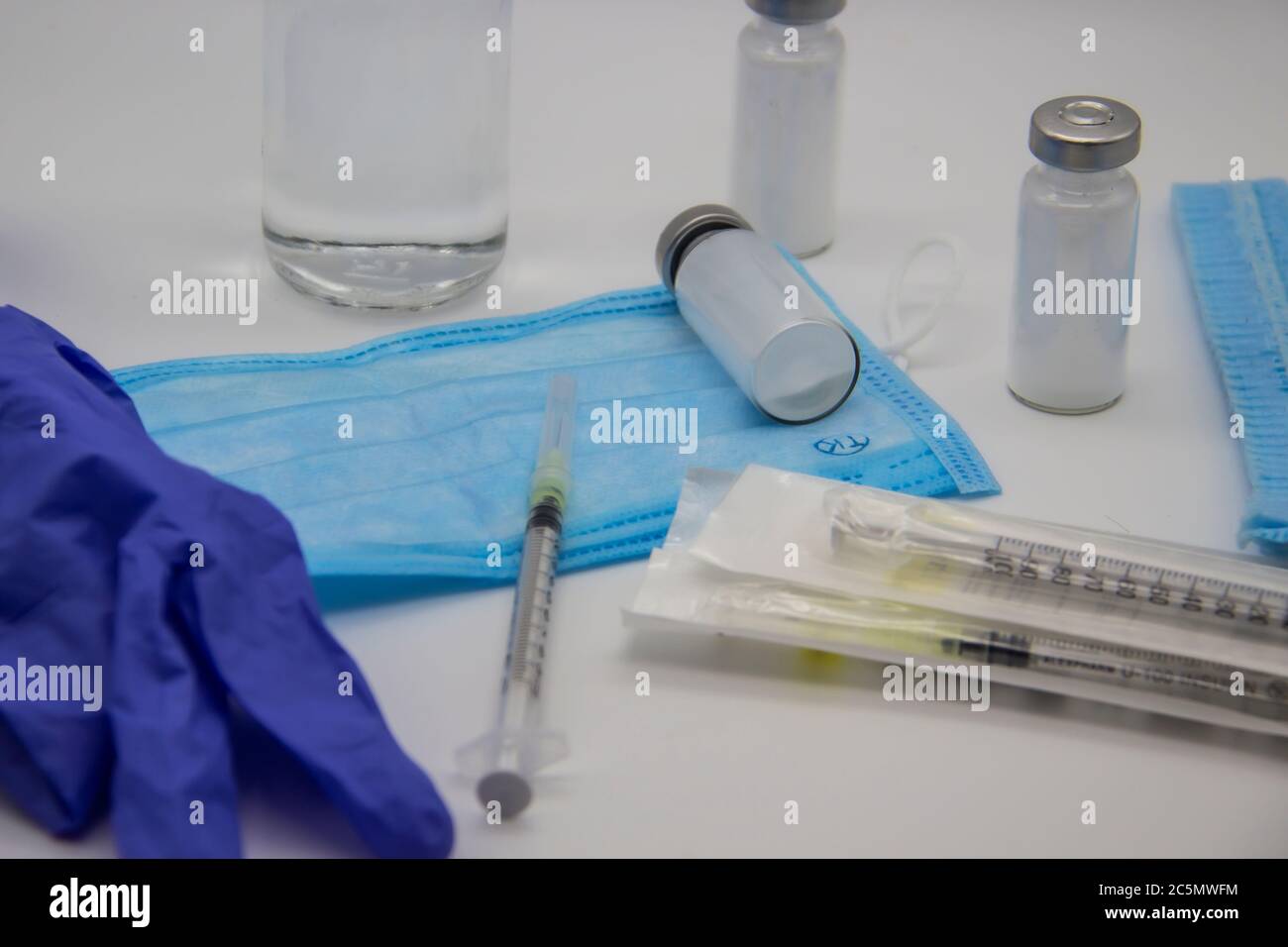 The bottles of insulin for diabetes and injection syringe. The ...