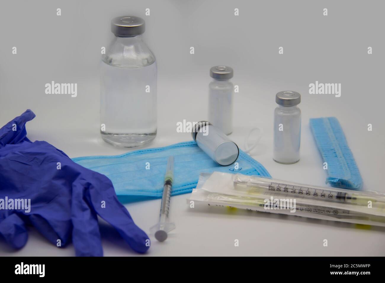 The bottles of insulin for diabetes and injection syringe. The ...