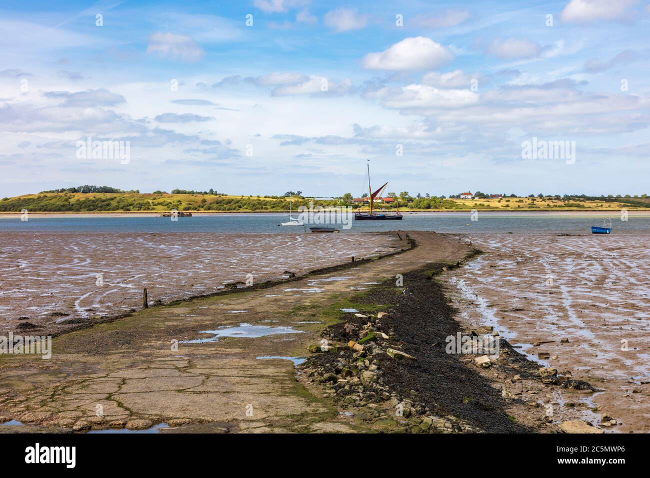 Views of Harty Ferry at low tide on a blustery summers day, near ...