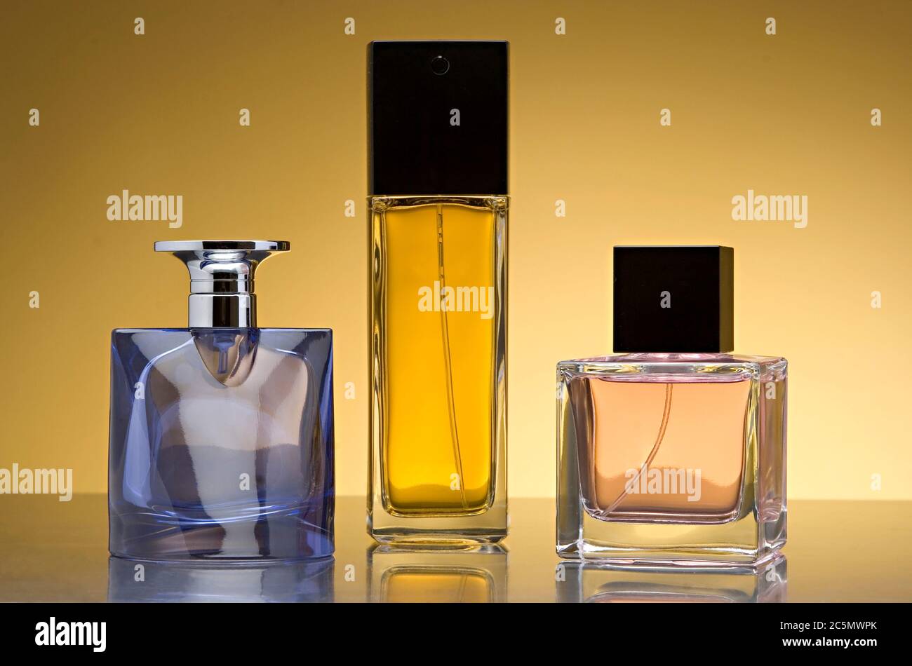 Perfume bottles with different shapes and design with reflection on a ...