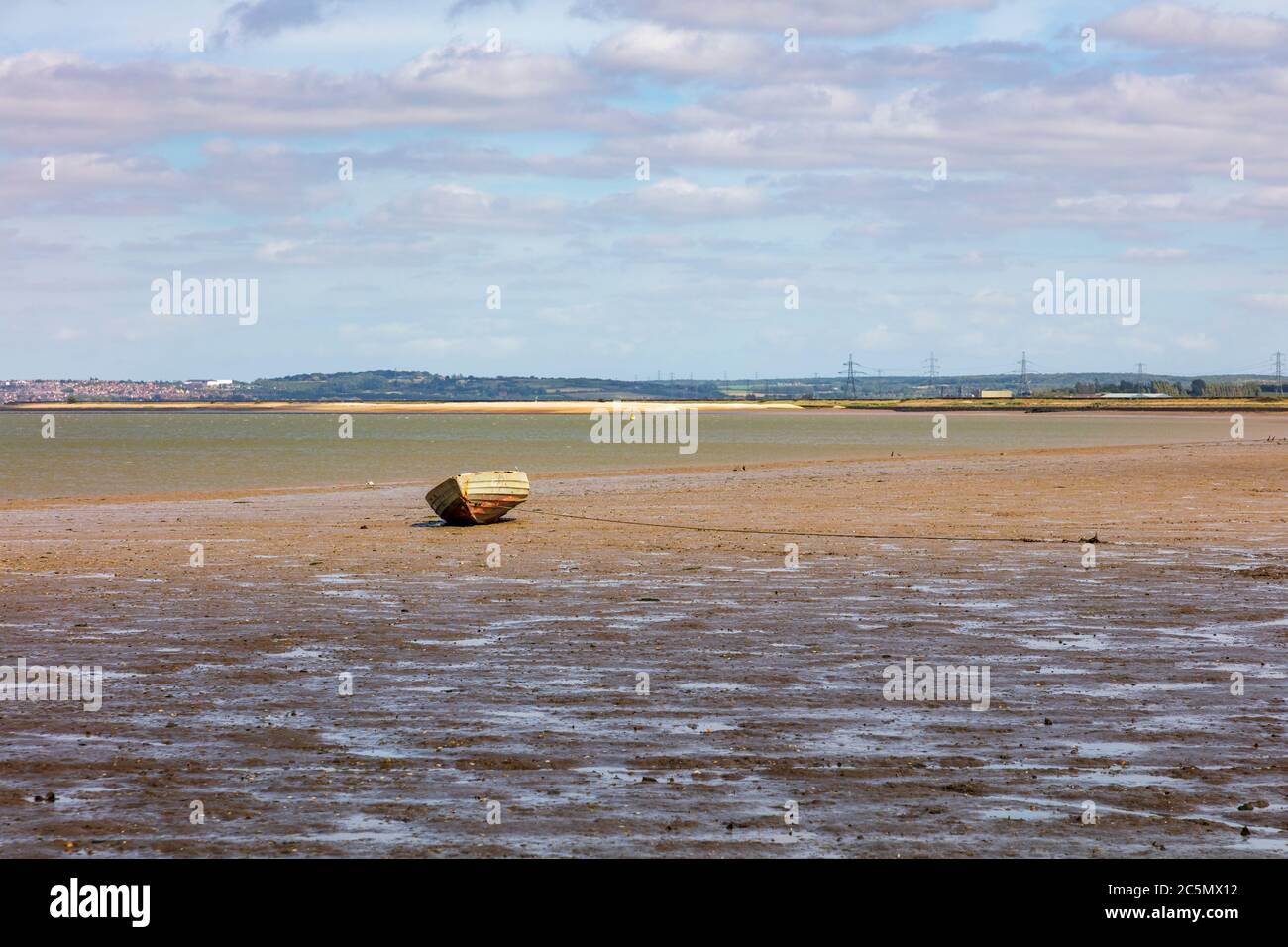 Views of Harty Ferry at low tide on a blustery summers day, near ...