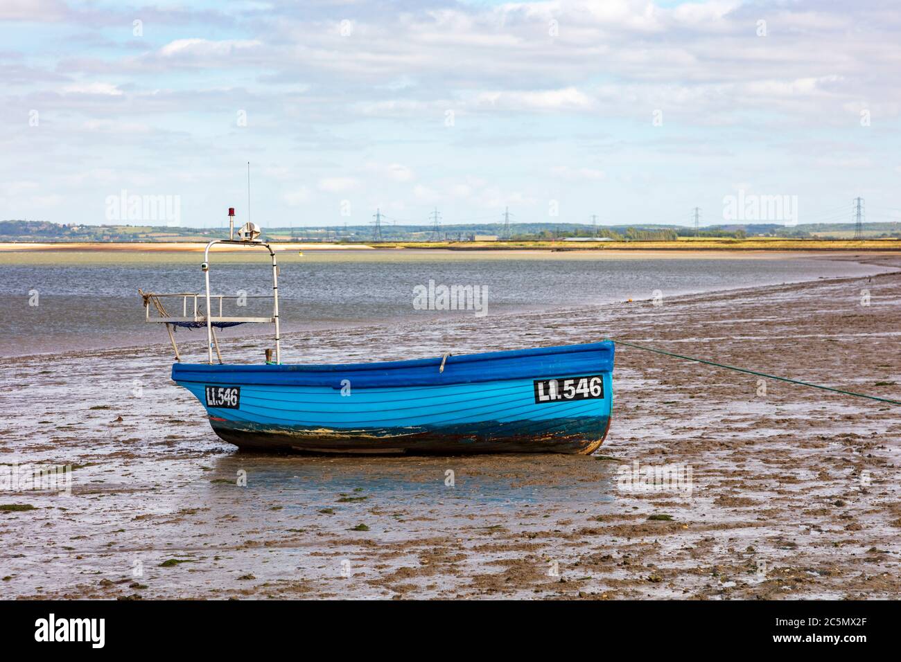 Views of Harty Ferry at low tide on a blustery summers day, near ...