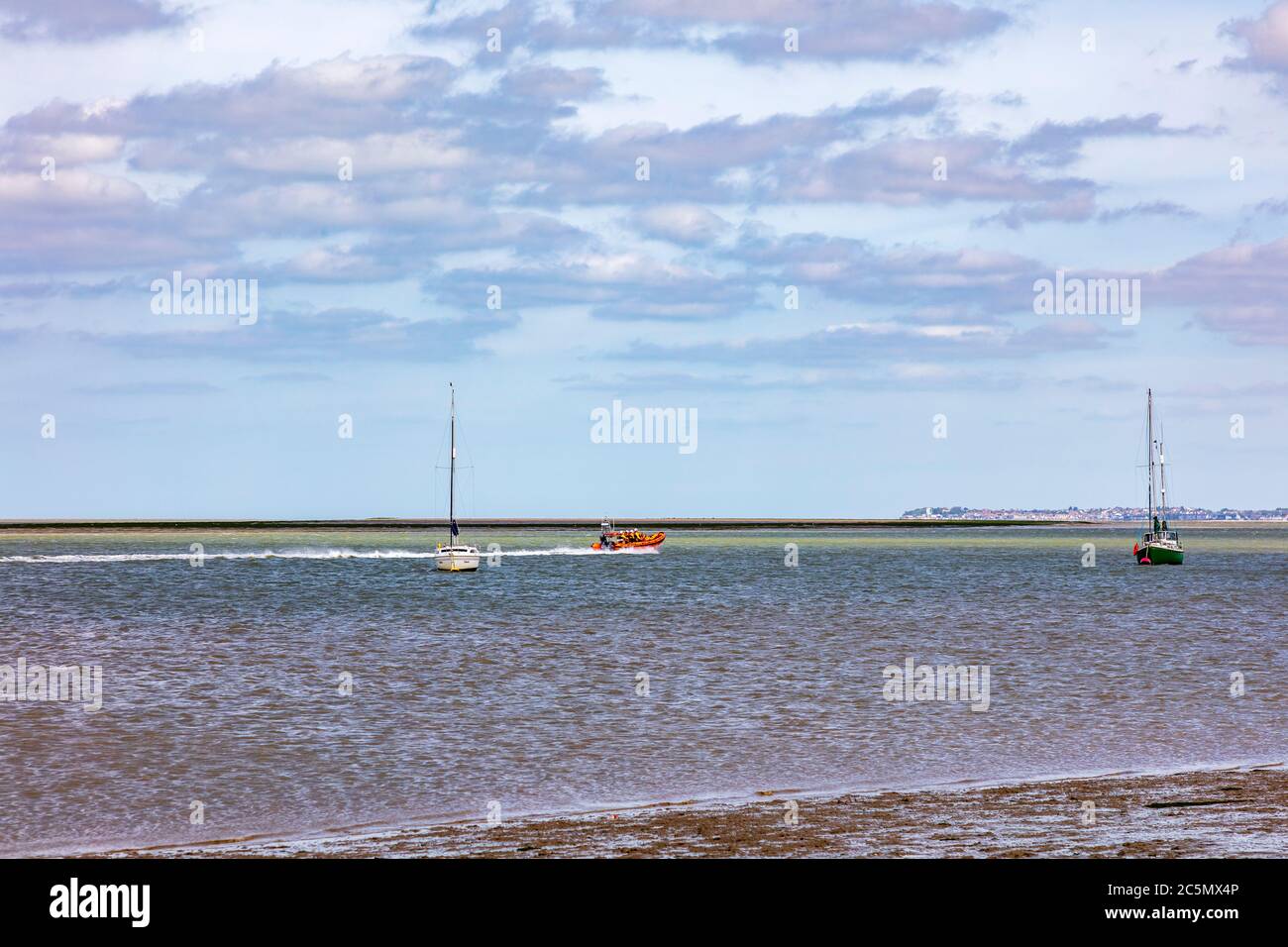 Whitstable's Inshore Rescue boat at Harty Ferry at low tide on a ...