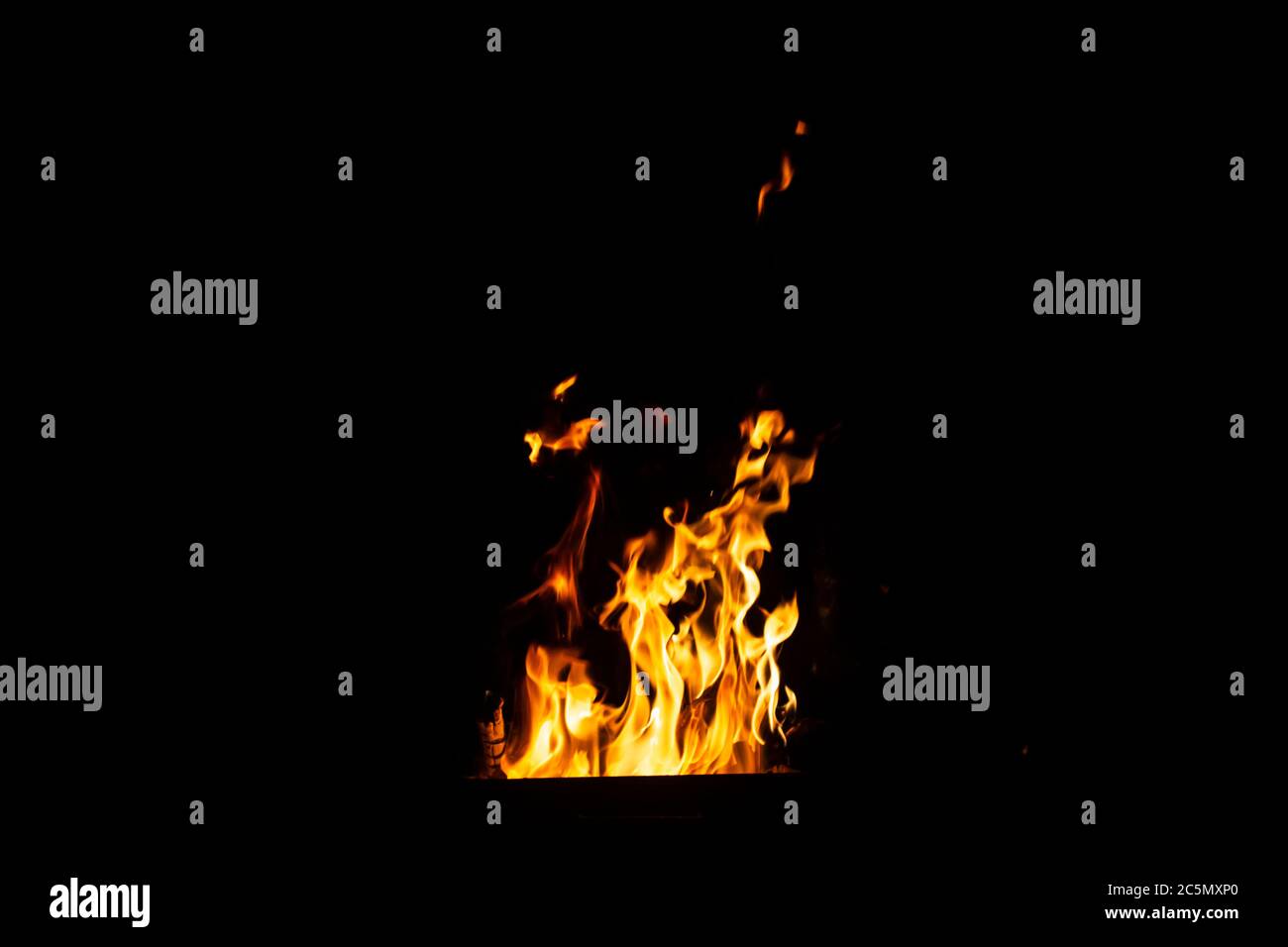 Danger fire on a dark background. Background from fire. Fire pattern ...