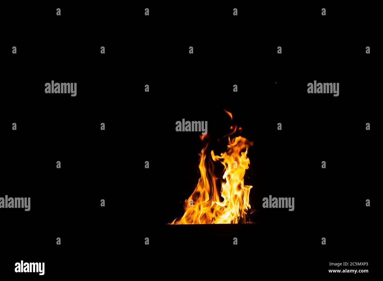 Danger fire on a dark background. Background from fire. Fire pattern ...