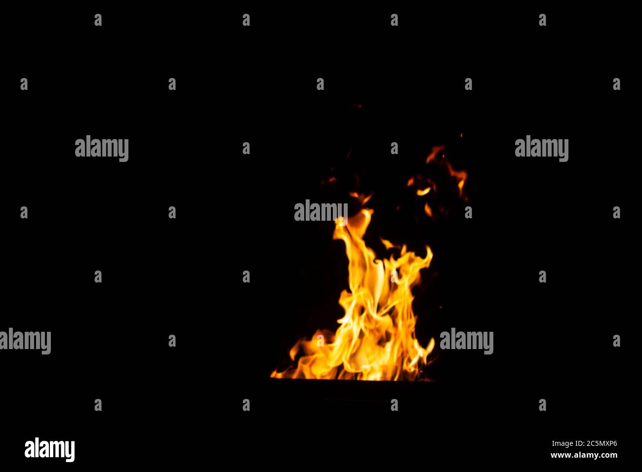 Danger fire on a dark background. Background from fire. Fire pattern ...