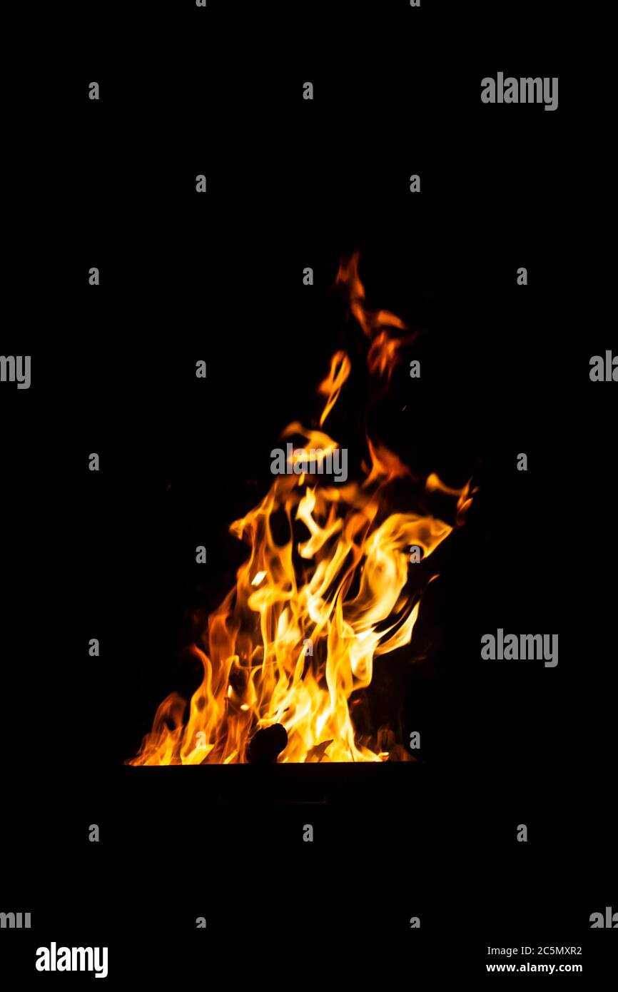 Danger fire on a dark background. Background from fire. Fire pattern ...