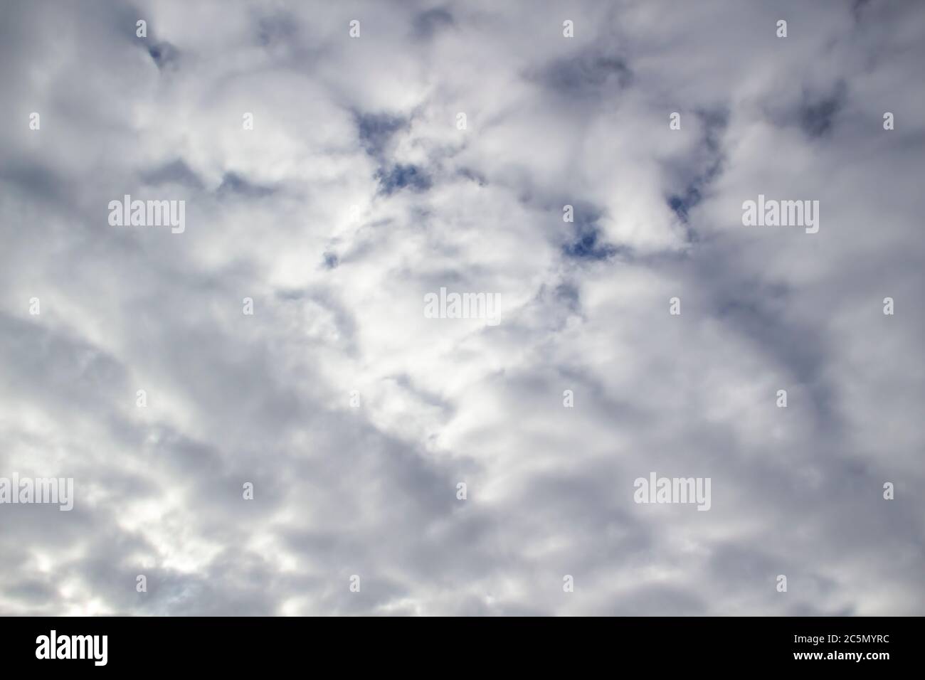 A beautiful clouds with light from sun in the sky. A background with ...
