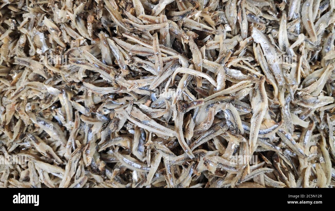 Heap of dried peeled anchovies. Popular ingredient in Asian cooking ...