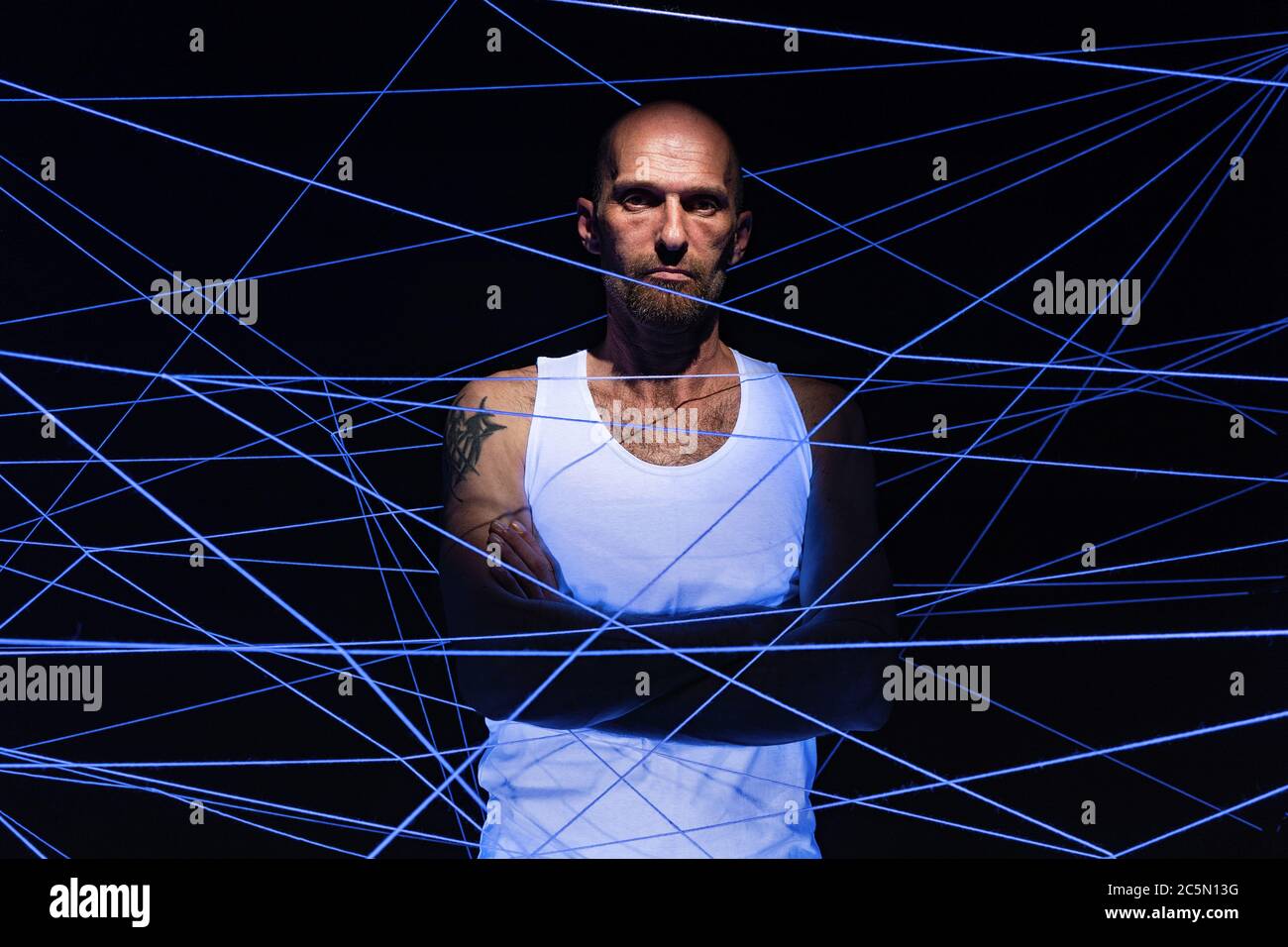 Tangled arms hi-res stock photography and images - Alamy