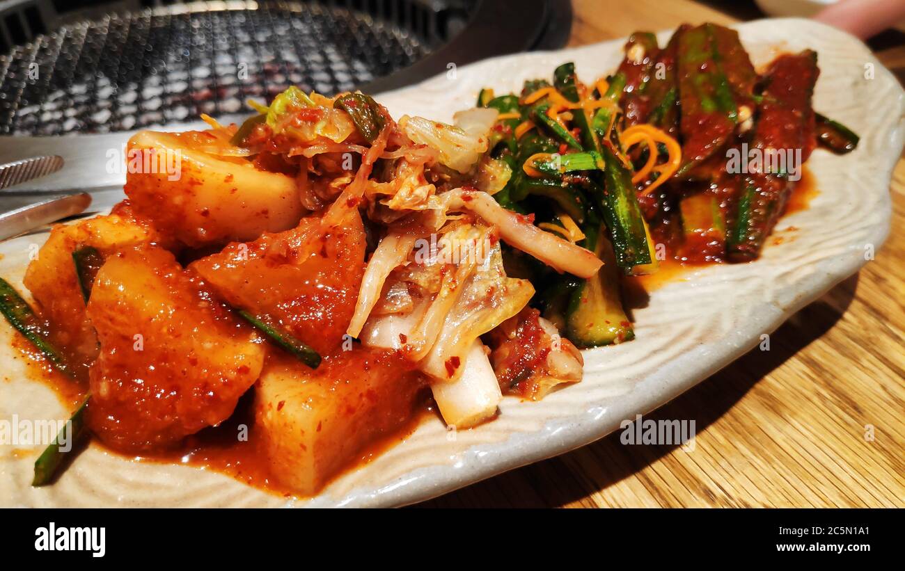 Traditional Korean food of spicy kimchi on a plate Stock Photo - Alamy