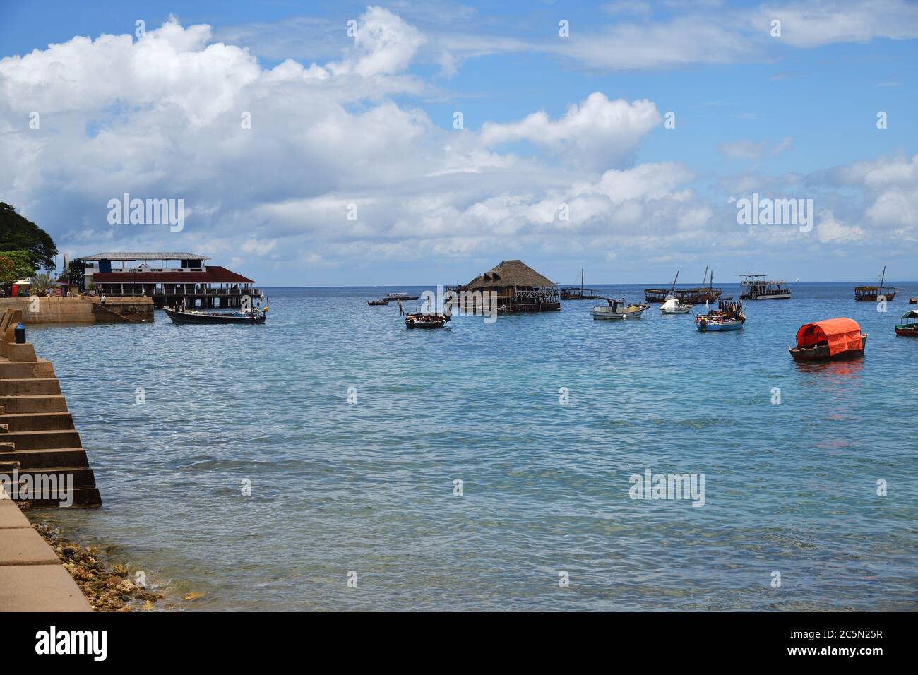 Zanzibar, Tanzania - October 7, 2019: Fishing boats and other vessels ...
