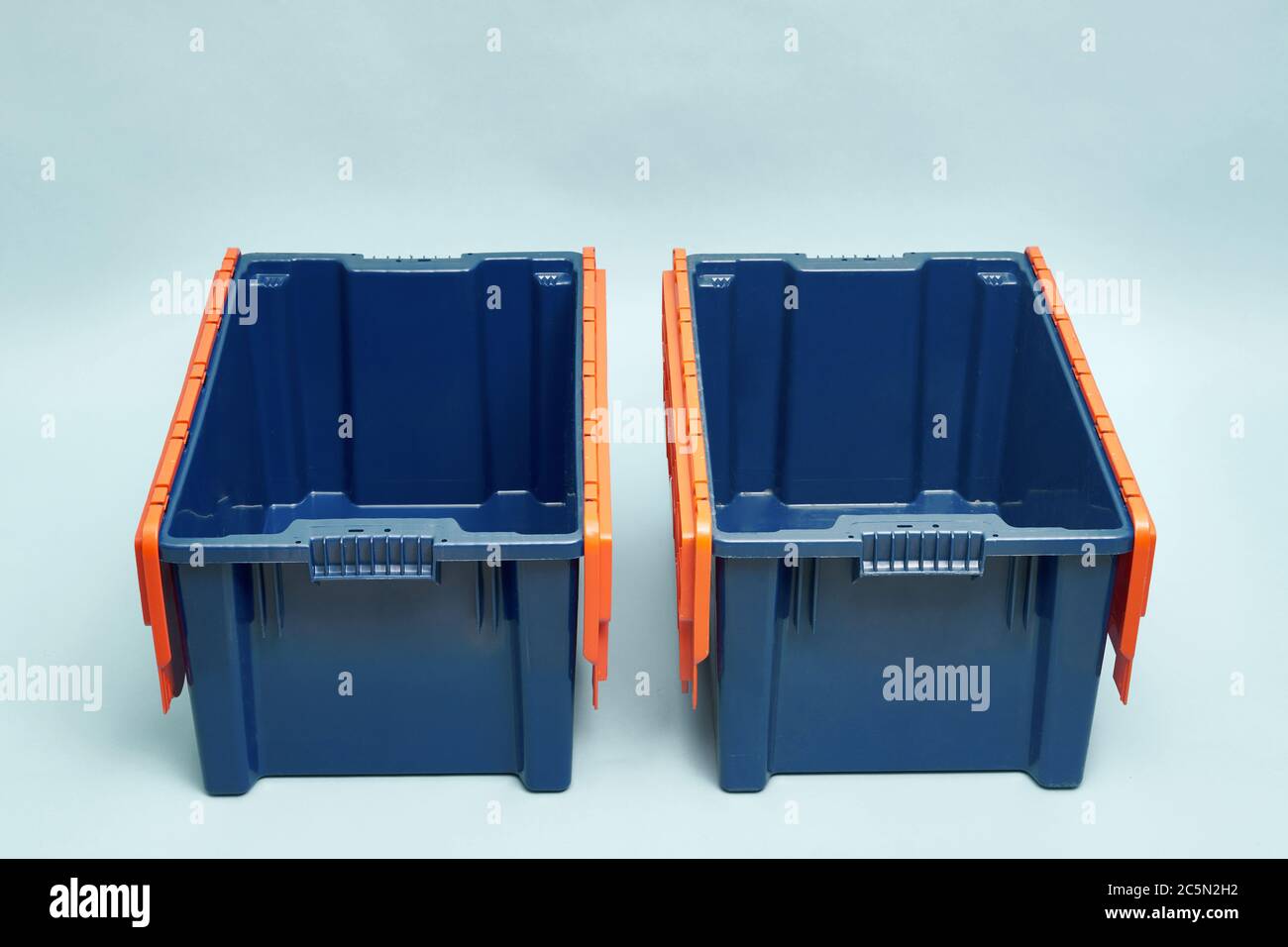 Plastic storage boxes. Boxes for the delivery of products. Orderly ...