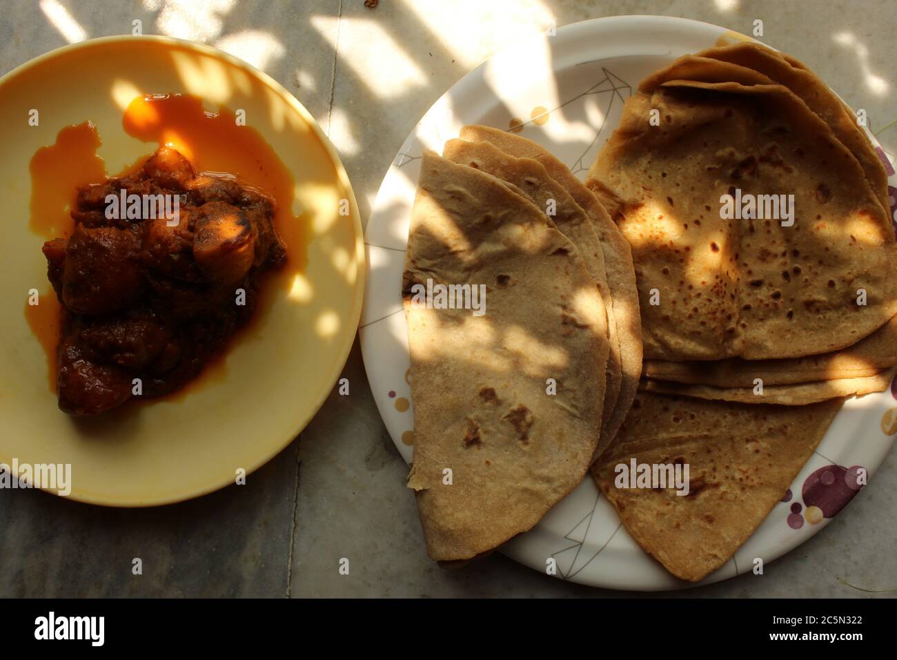 Indian Breakfast arrangement with 'Roti' and 'Paratha', made with Atta ...