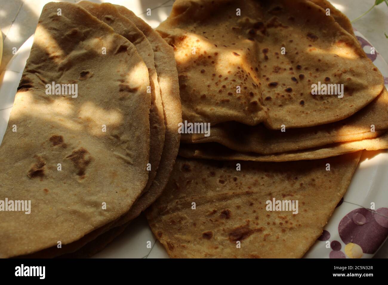 Indian Breakfast arrangement with 'Roti' and 'Paratha', made with Atta ...