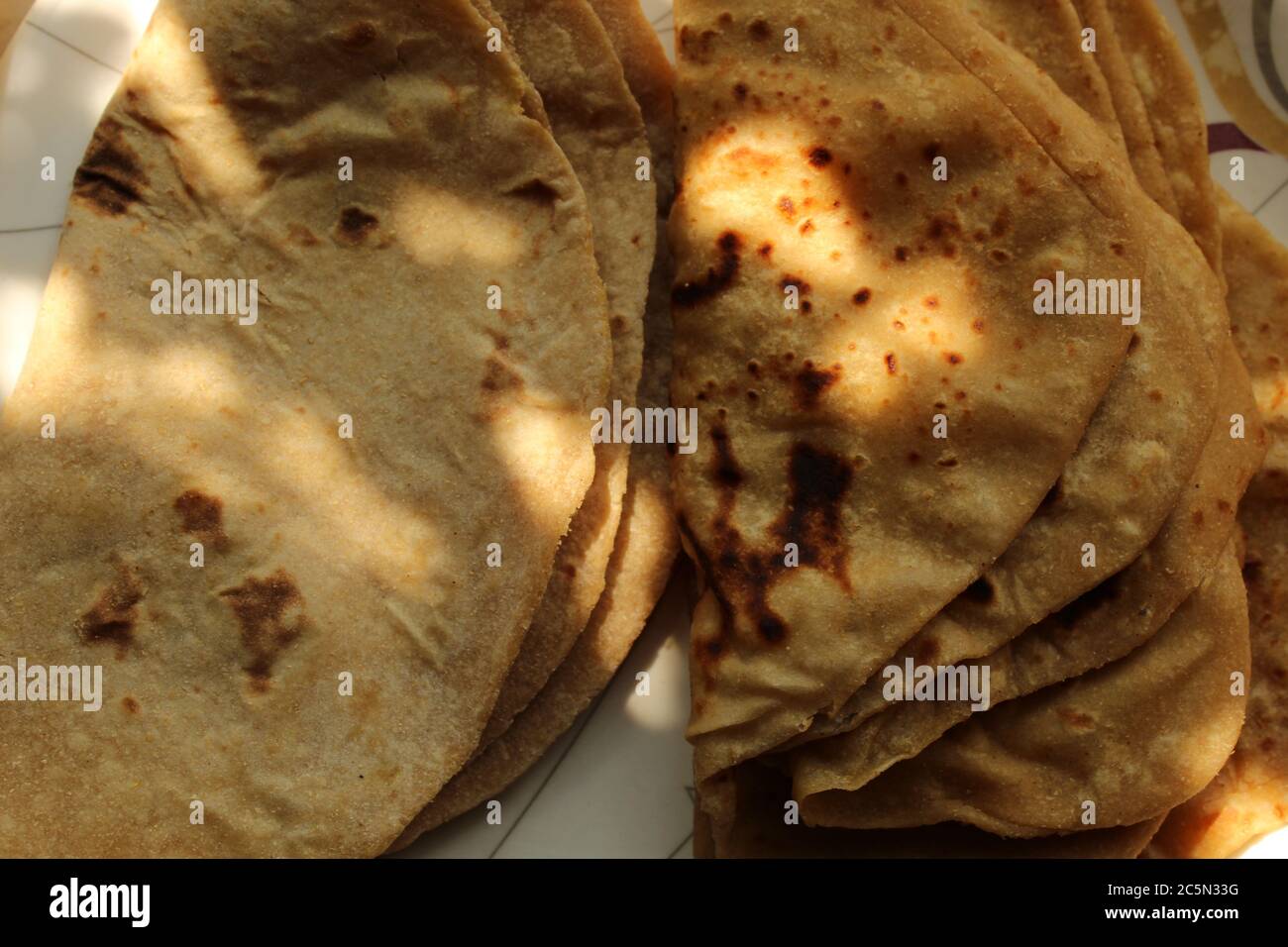 Indian Breakfast arrangement with 'Roti' and 'Paratha', made with Atta ...