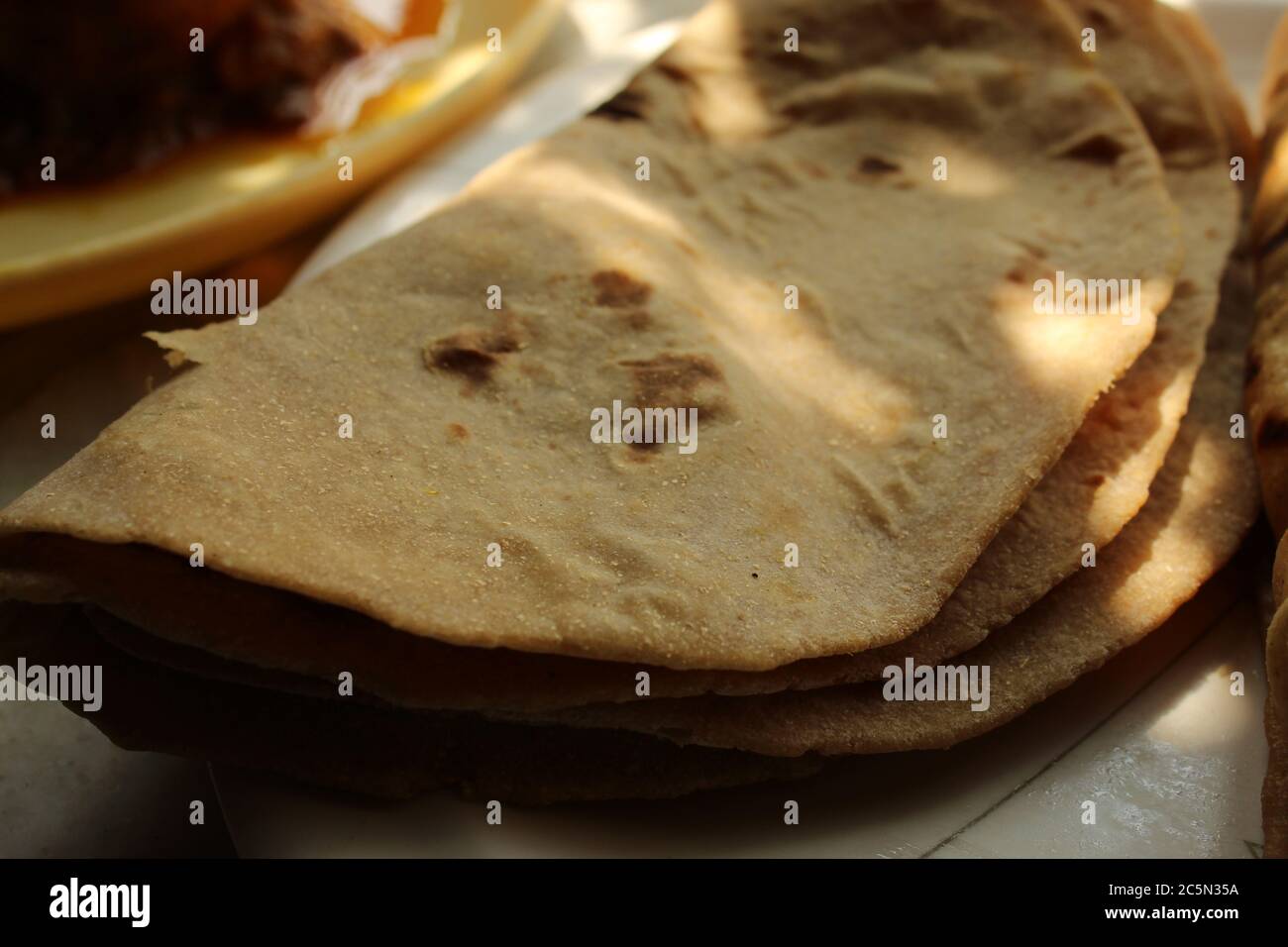 Indian Breakfast arrangement with 'Roti' and 'Paratha', made with Atta ...