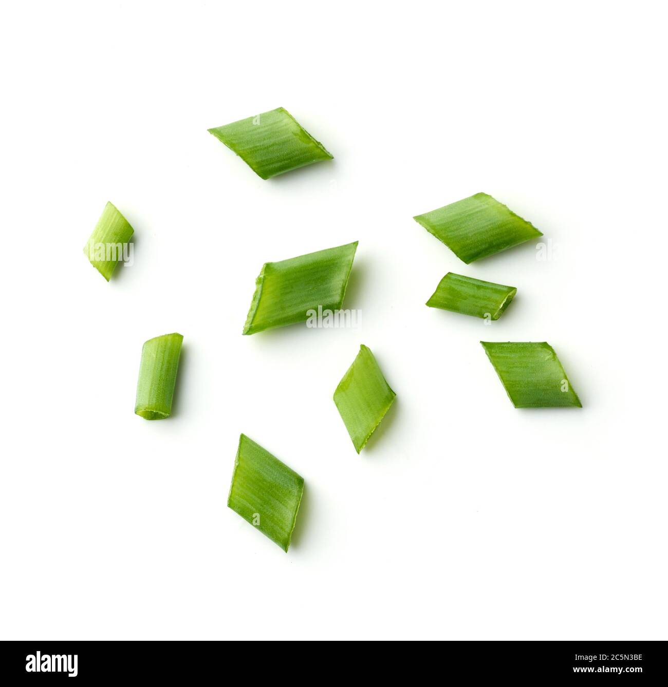 Raw green onions chives Cut Out Stock Images & Pictures - Alamy