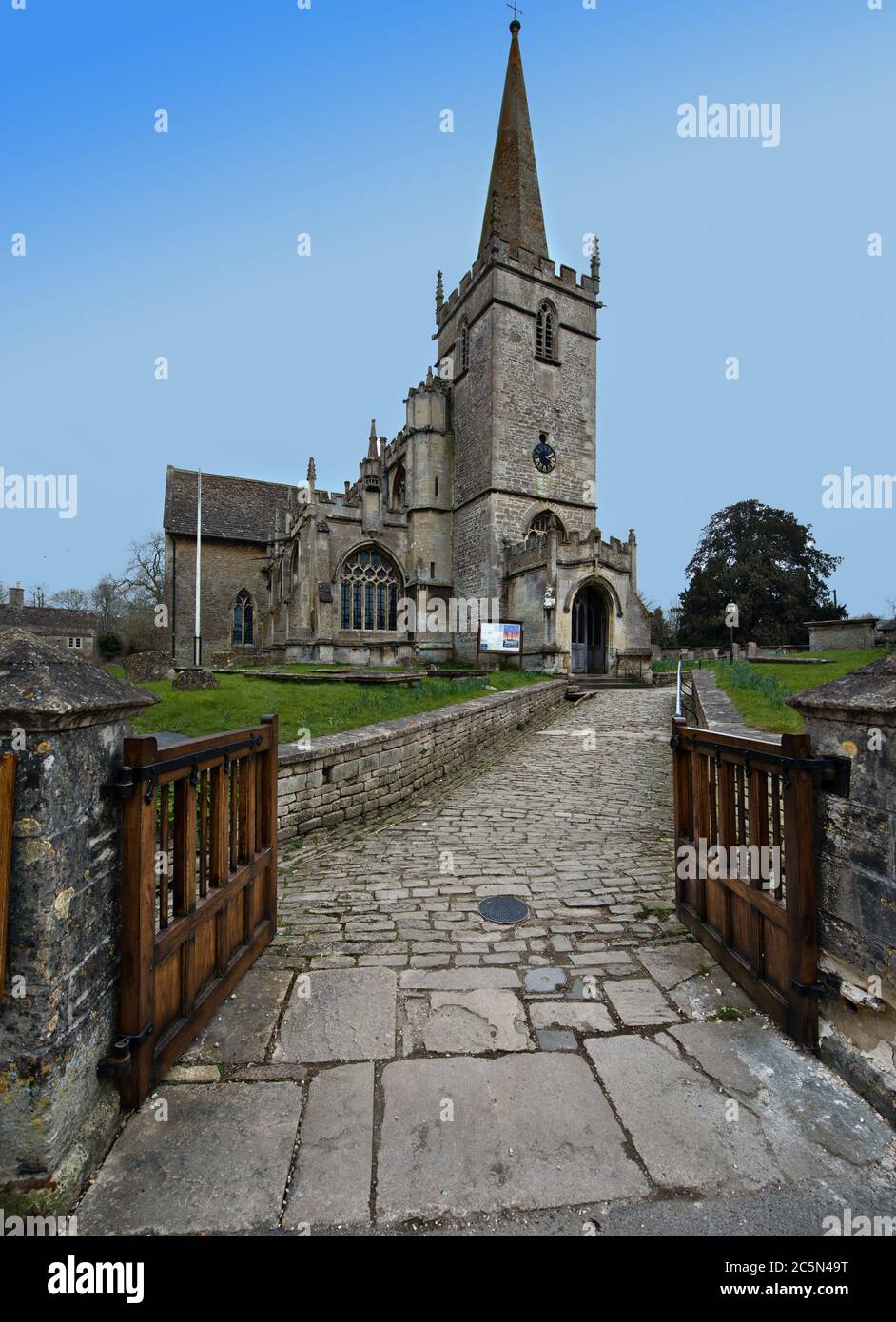 Outside the gates of St Cyriac's Church in Lacock village Wiltshire ...