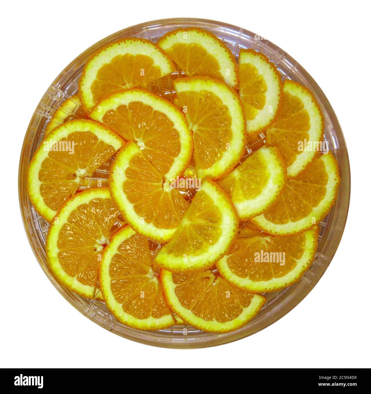 Ripe orange half slices on the dish isolated. Clipping path included ...