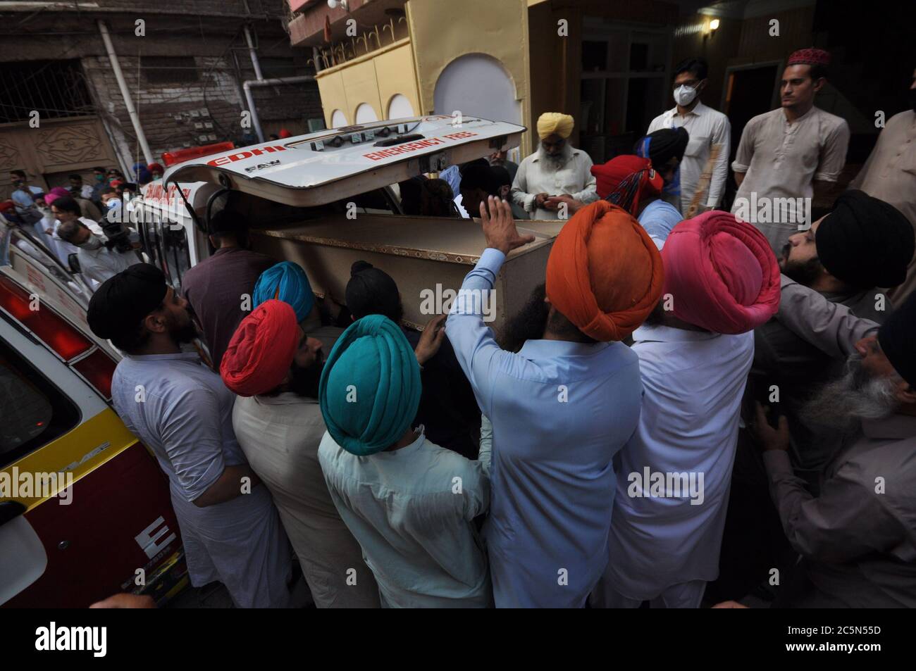 (7/4/2020) Minority Sikh gather beside the dead bodies of Sikhs in ...