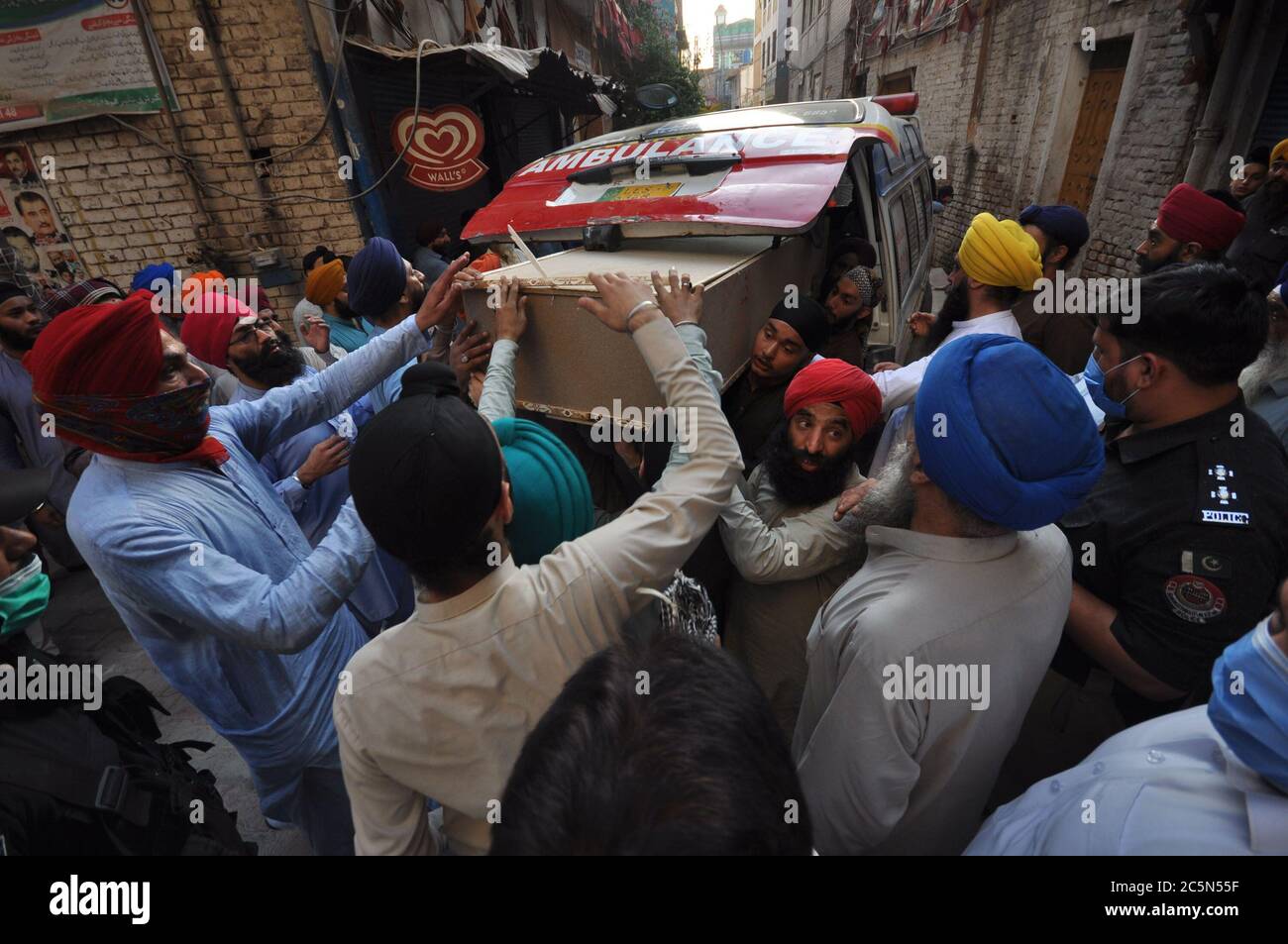 (7/4/2020) Minority Sikh gather beside the dead bodies of Sikhs in ...