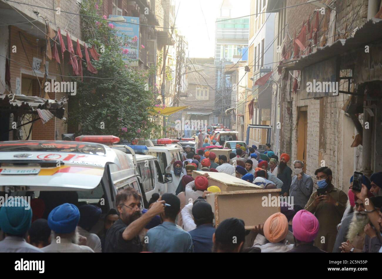 (7/4/2020) Minority Sikh gather beside the dead bodies of Sikhs in ...