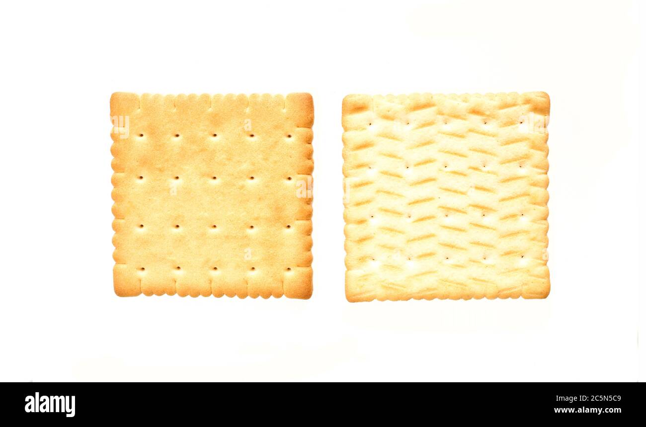 Two sides of french biscuit on white background. Tea butter cookie ...