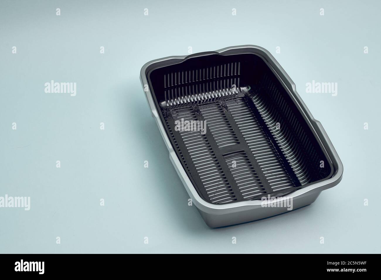 New gray, empty cat tray. Toilet for the cat Stock Photo - Alamy