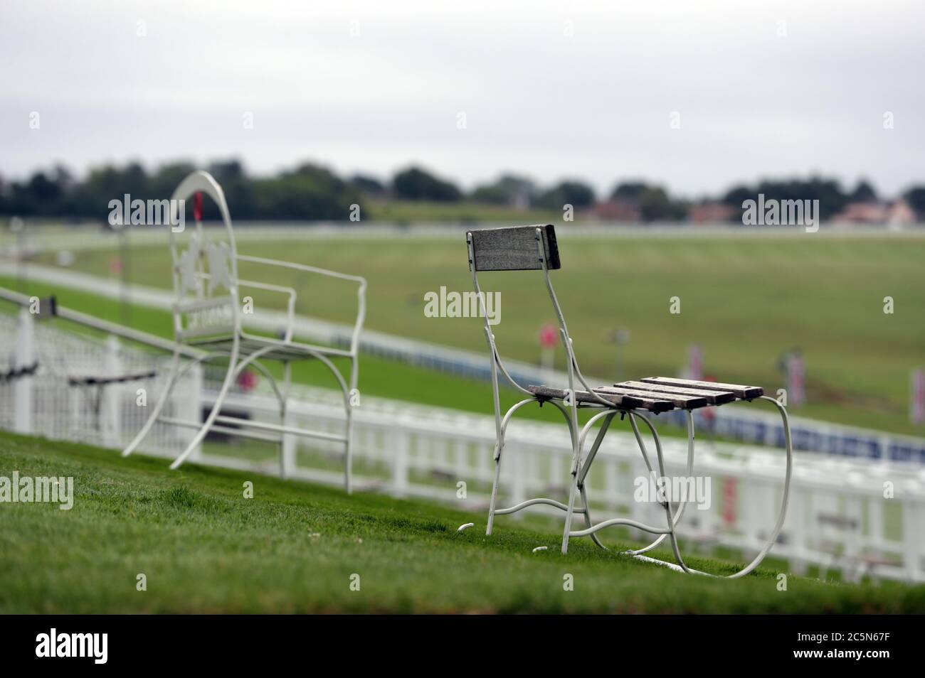 Empty seating at Epsom Racecourse Stock Photo - Alamy