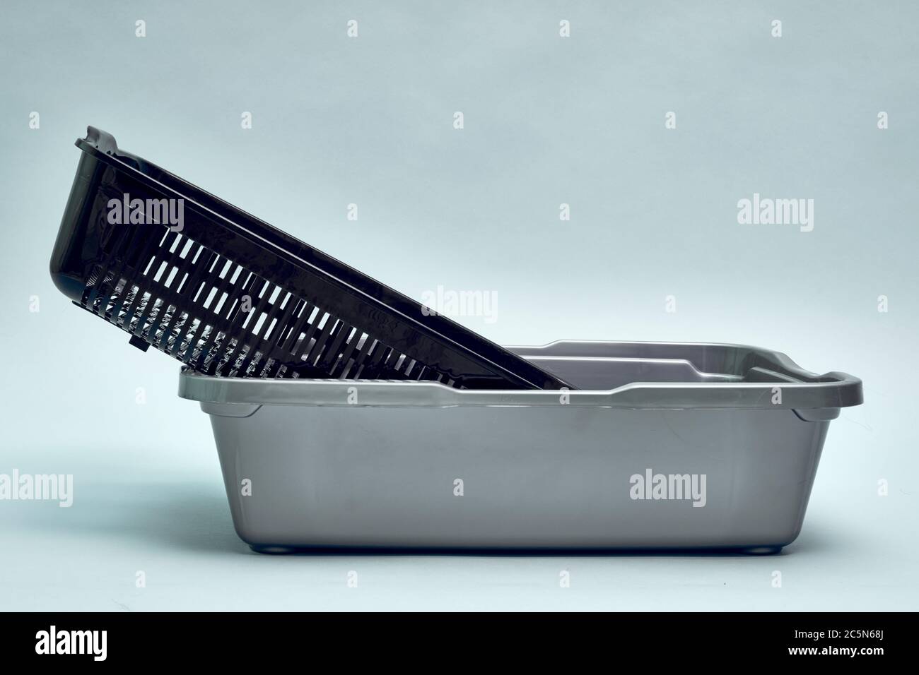 New gray, empty cat tray. Toilet for the cat Stock Photo - Alamy