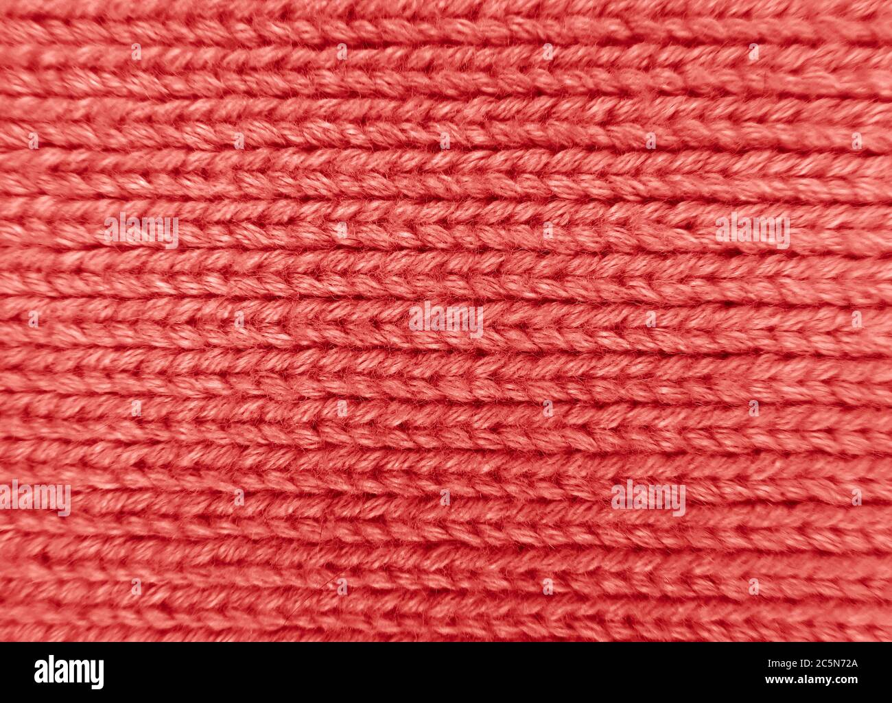 Close up of woolen knitted texture - red Stock Photo - Alamy