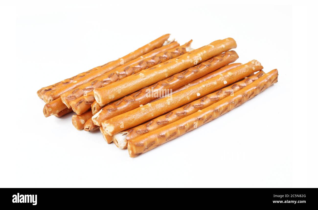 Salty and crispy cracker sticks isolated on white background. Pretzel ...