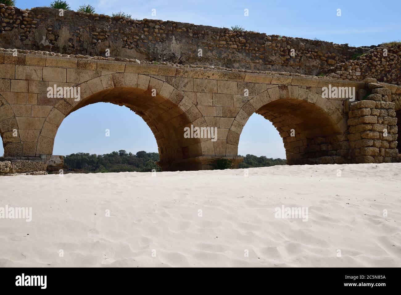 The ruins of the ancient Roman Aqueduct in city of Caesarea Maritima ...