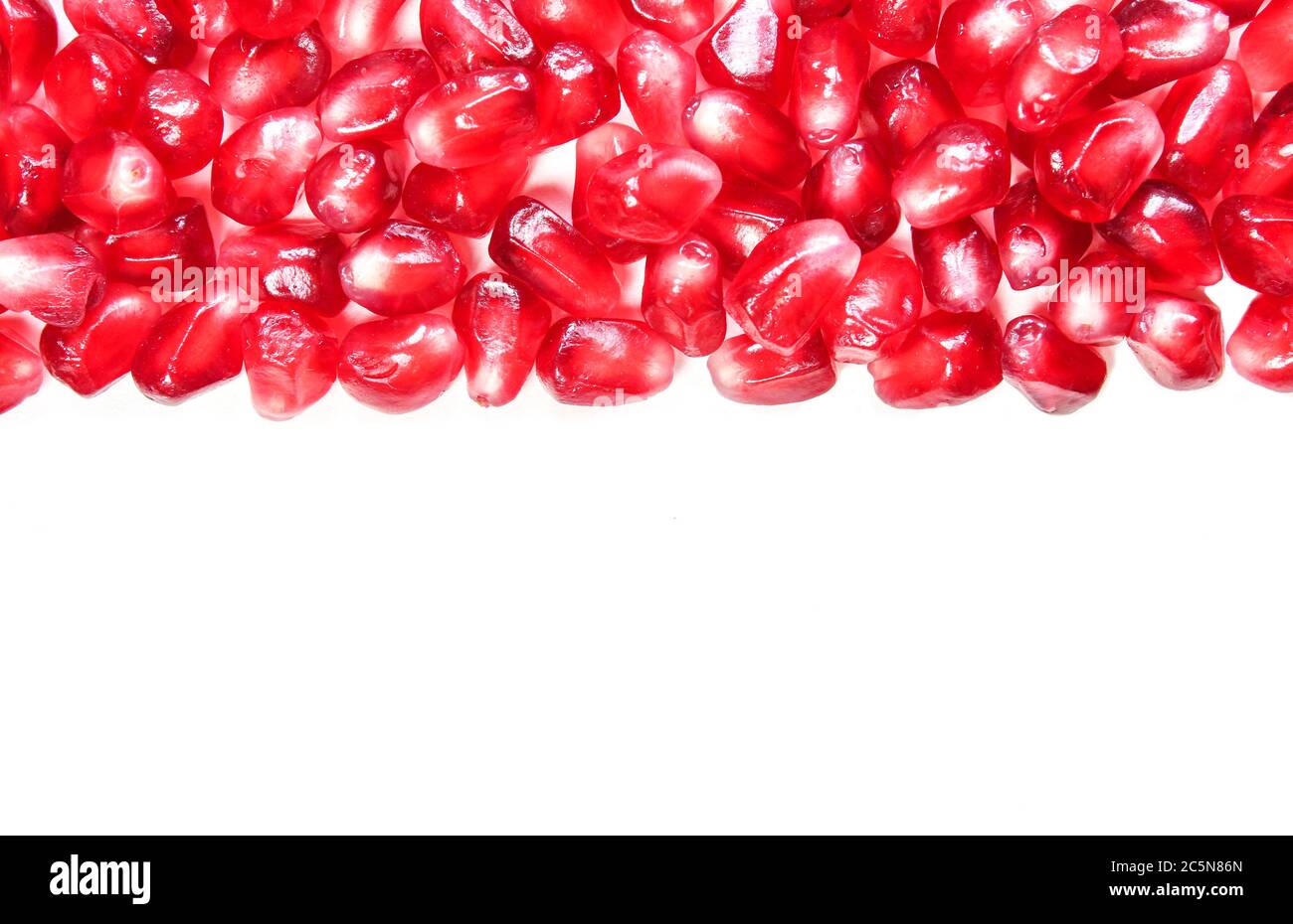 Group of pomegranate seeds isolated on white background. Juicy red ...