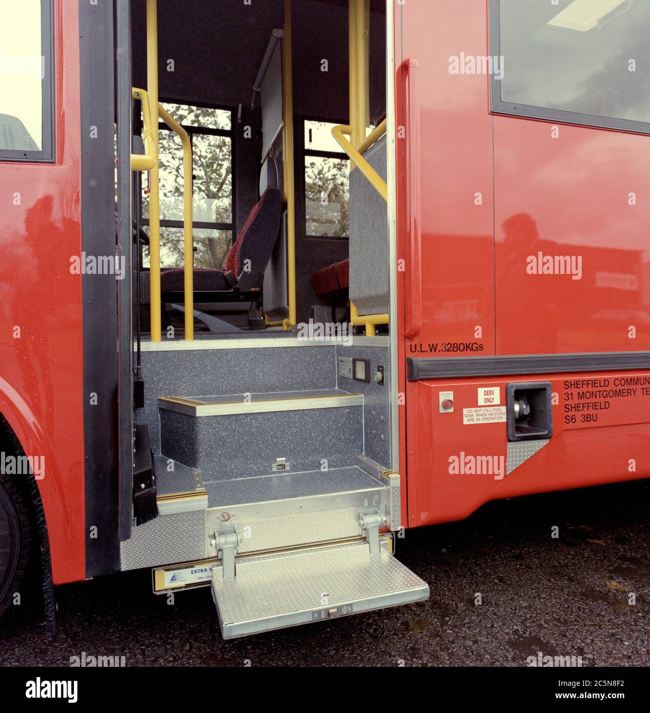 Drop Down steps on a minibus Stock Photo - Alamy