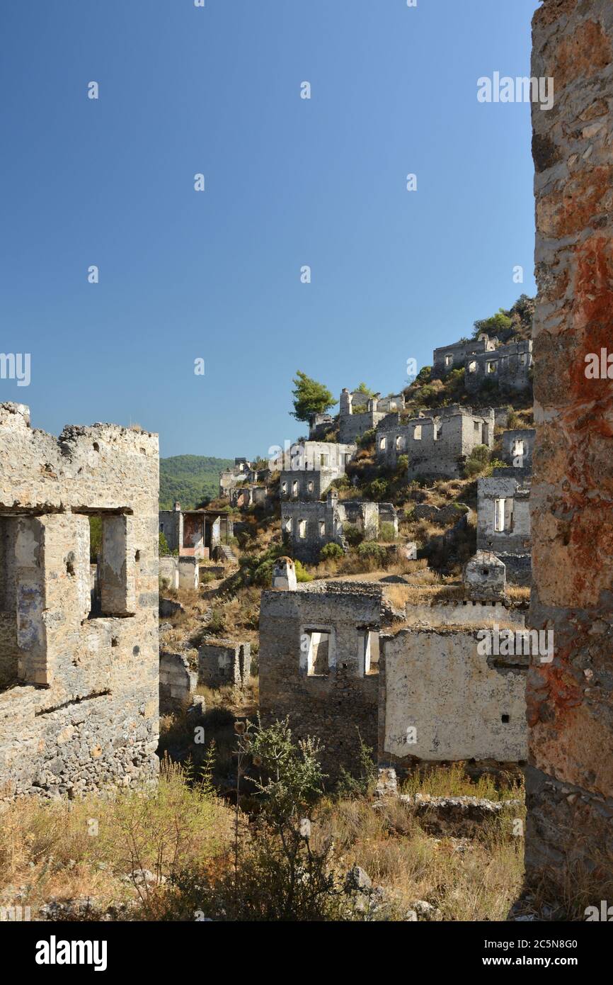 Ruins of the abandoned town of Kayaköy in Fethiye, Turkey Stock Photo ...
