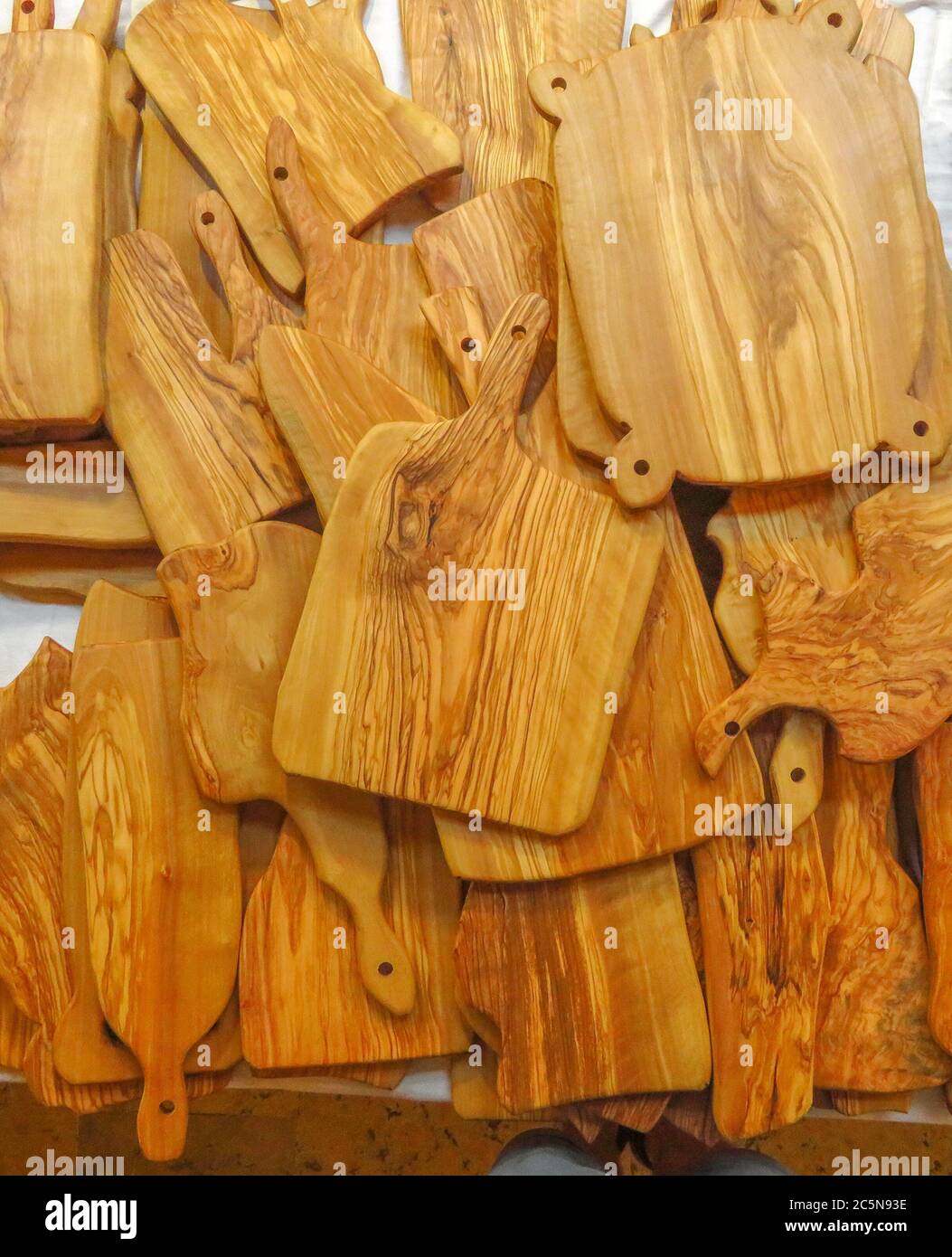 Background of cutting boards made of olive tree Stock Photo - Alamy