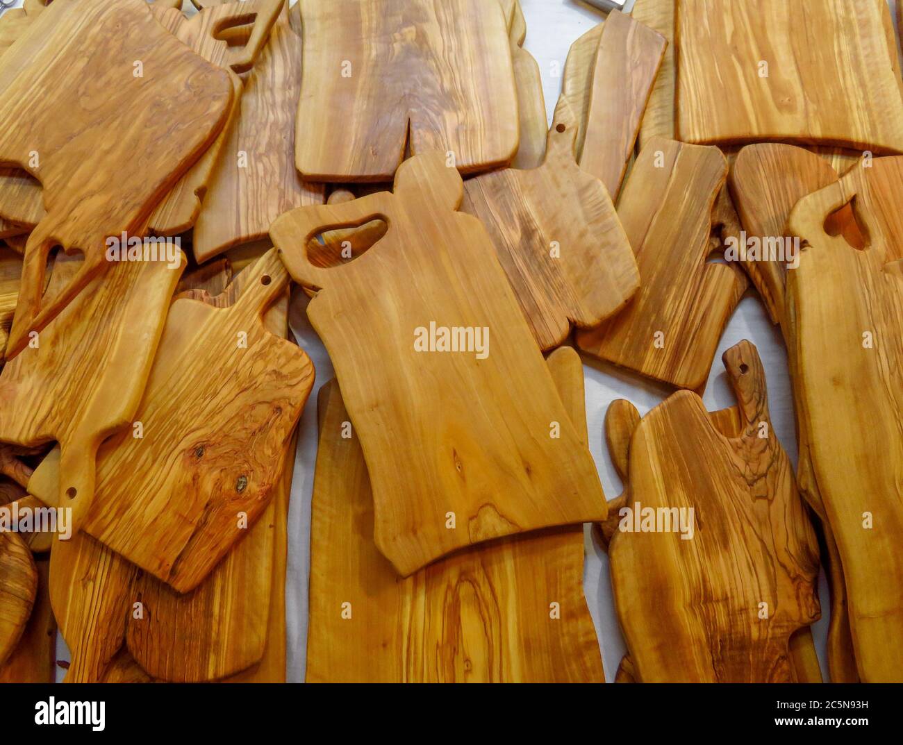 Background of cutting boards made of olive tree Stock Photo - Alamy