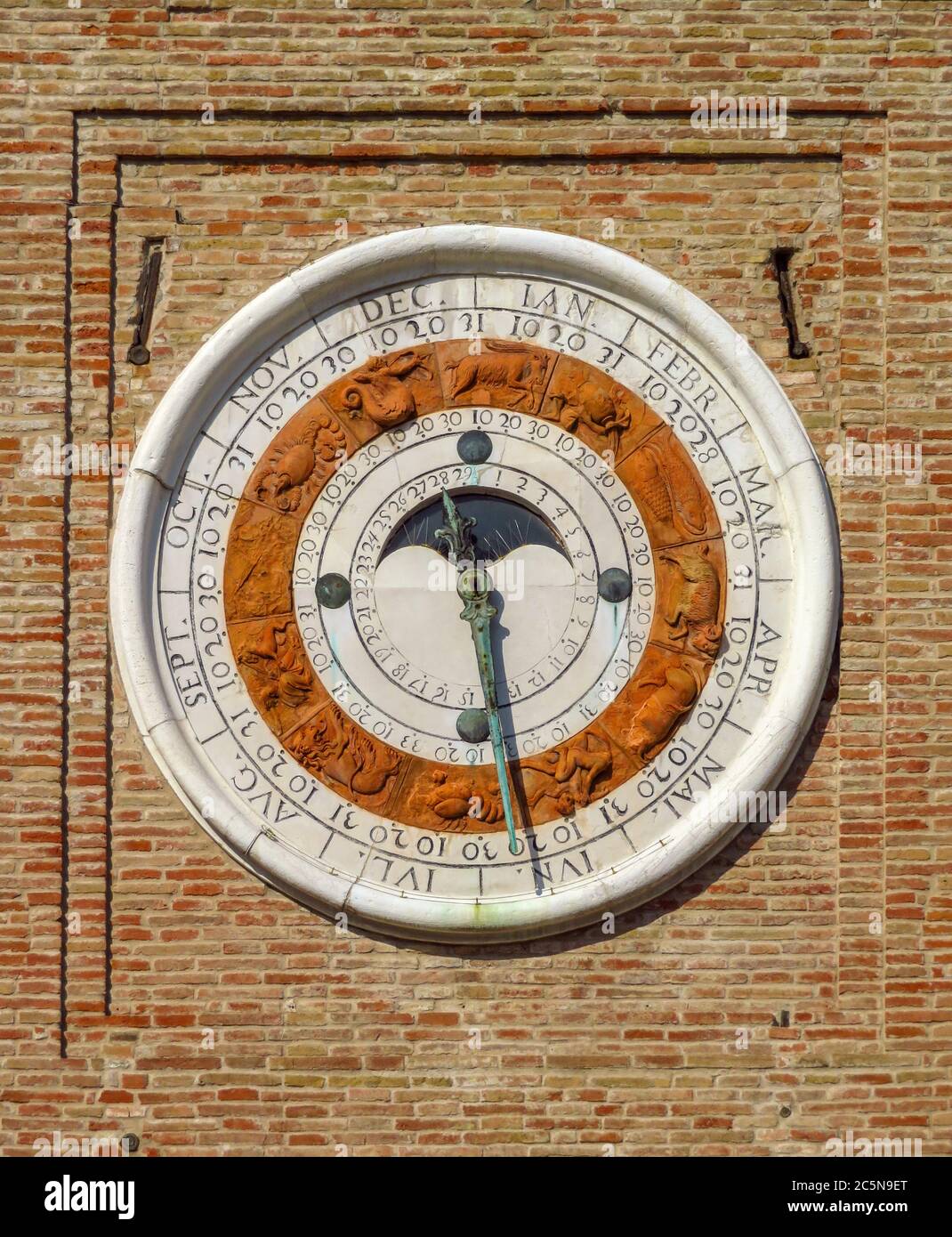 Ancient astronomical clock on the square Piazza tre Martiri in Rimini ...