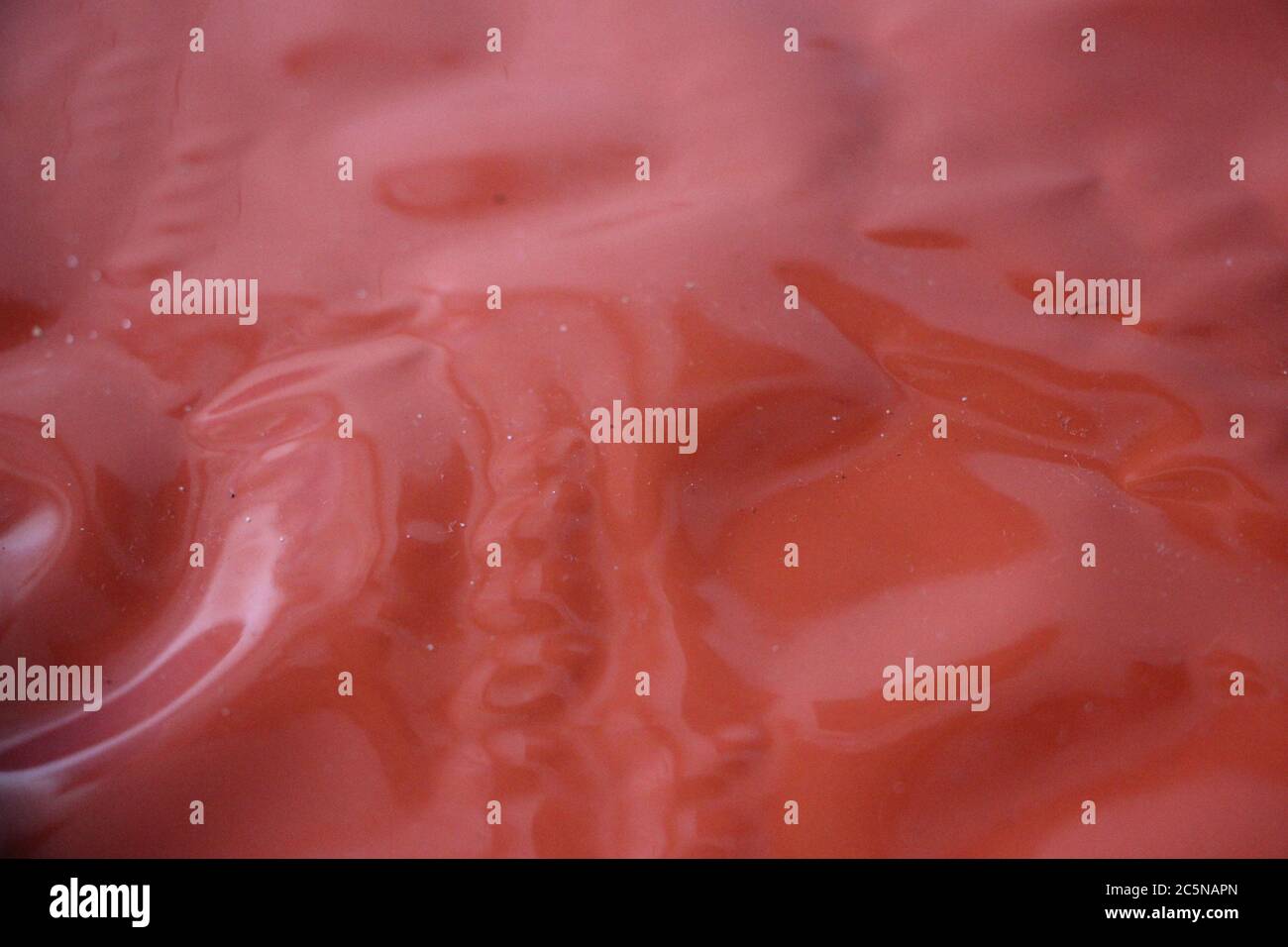 Close up of tomato red color vinyl uneven texture background Stock ...