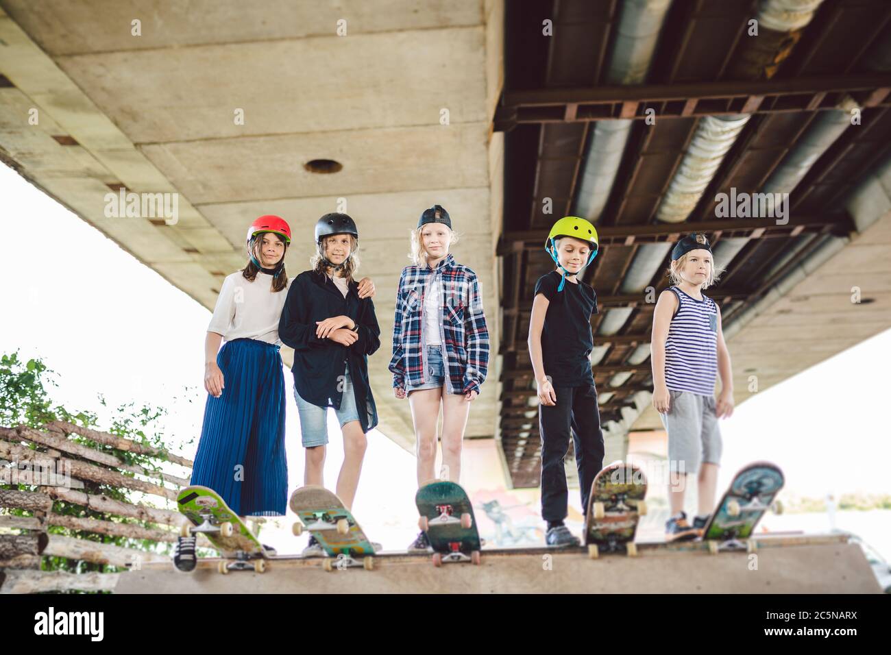 Extreme sport in city. Skateboarding Club for children. Group friends ...