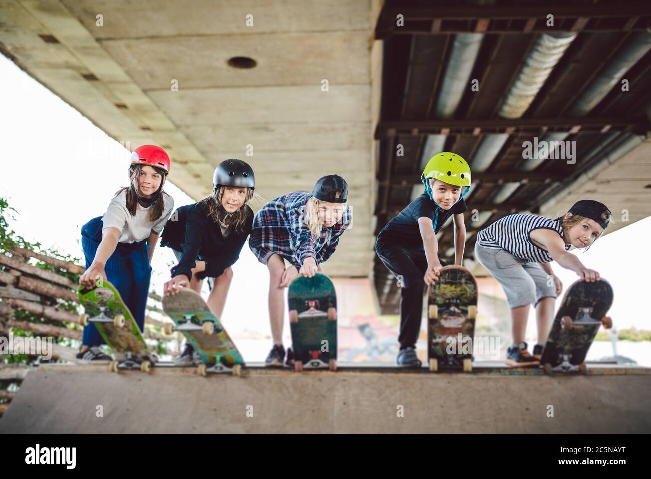 Extreme sport in city. Skateboarding Club for children. Group friends ...