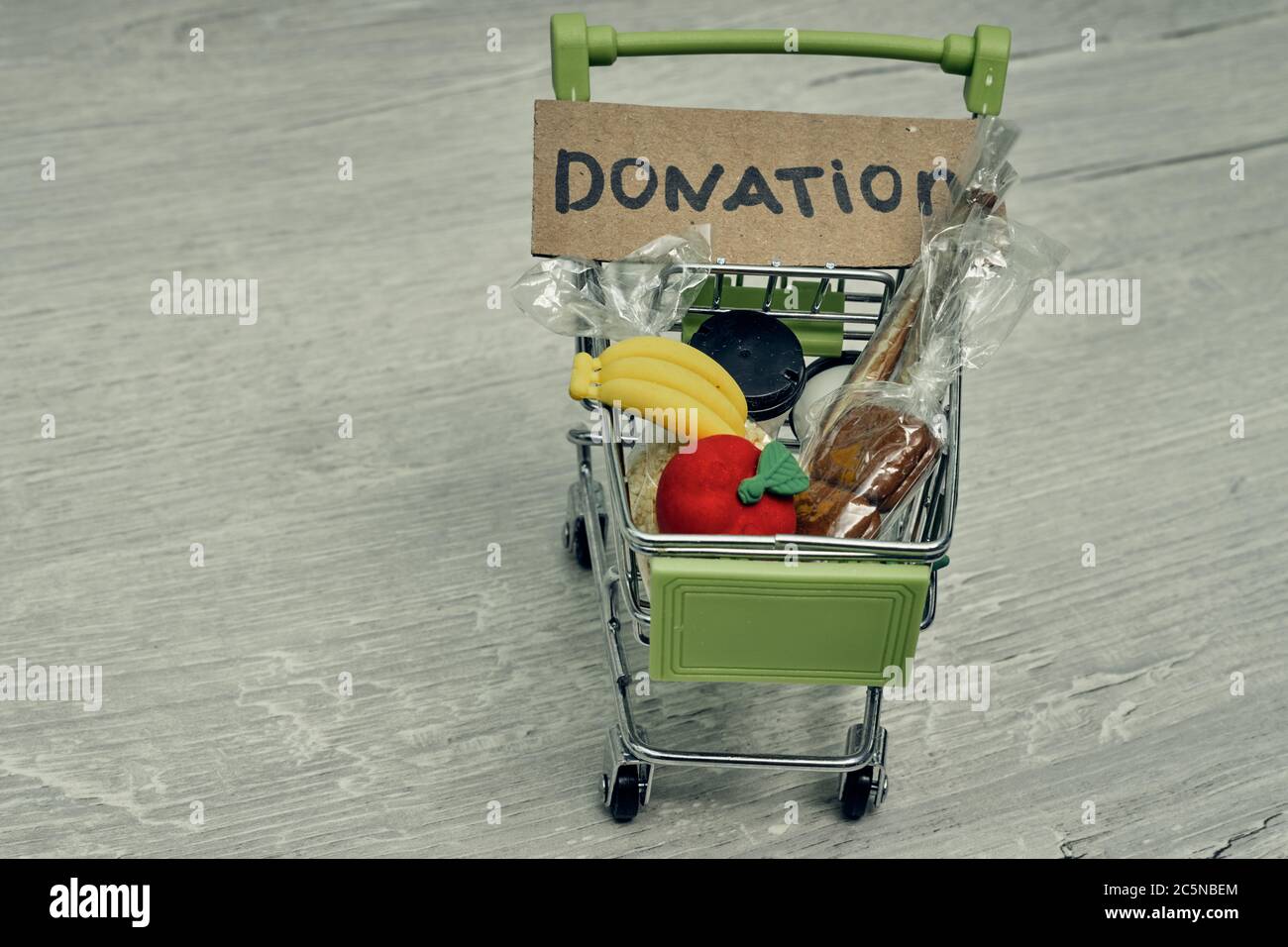 Donations food. Help products during a pandemic, charity. Cart with ...