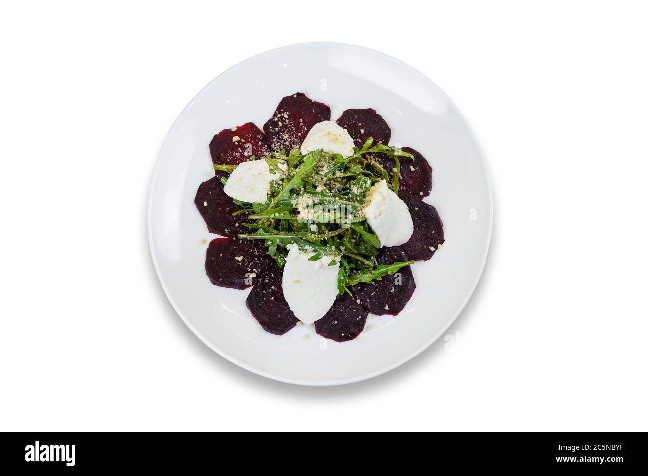 Beetroot salad with ricotta and arugula isolated on white Stock Photo ...
